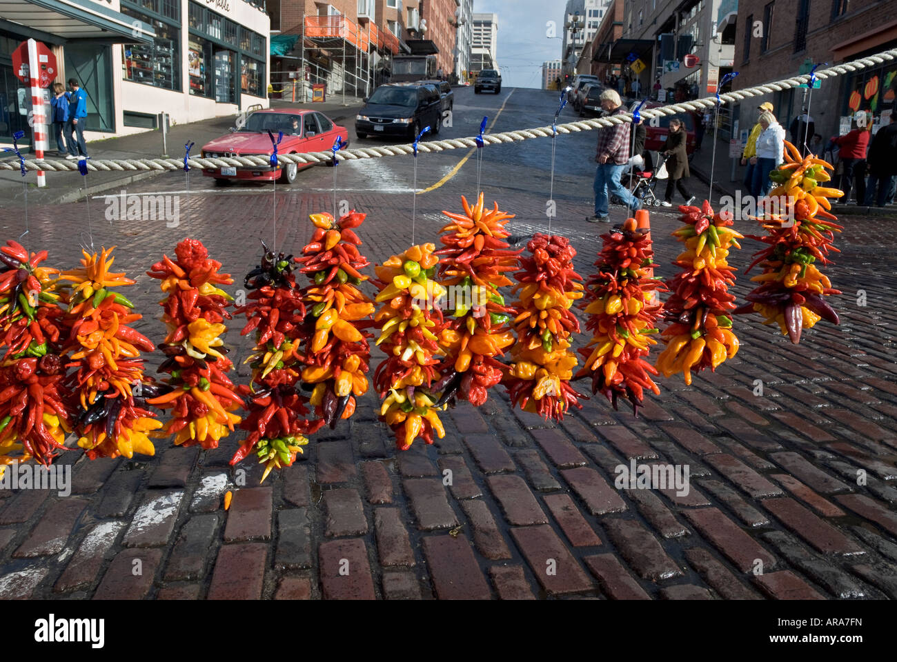 colorful chili peppers for sale on street alongside Pike Place Market ...