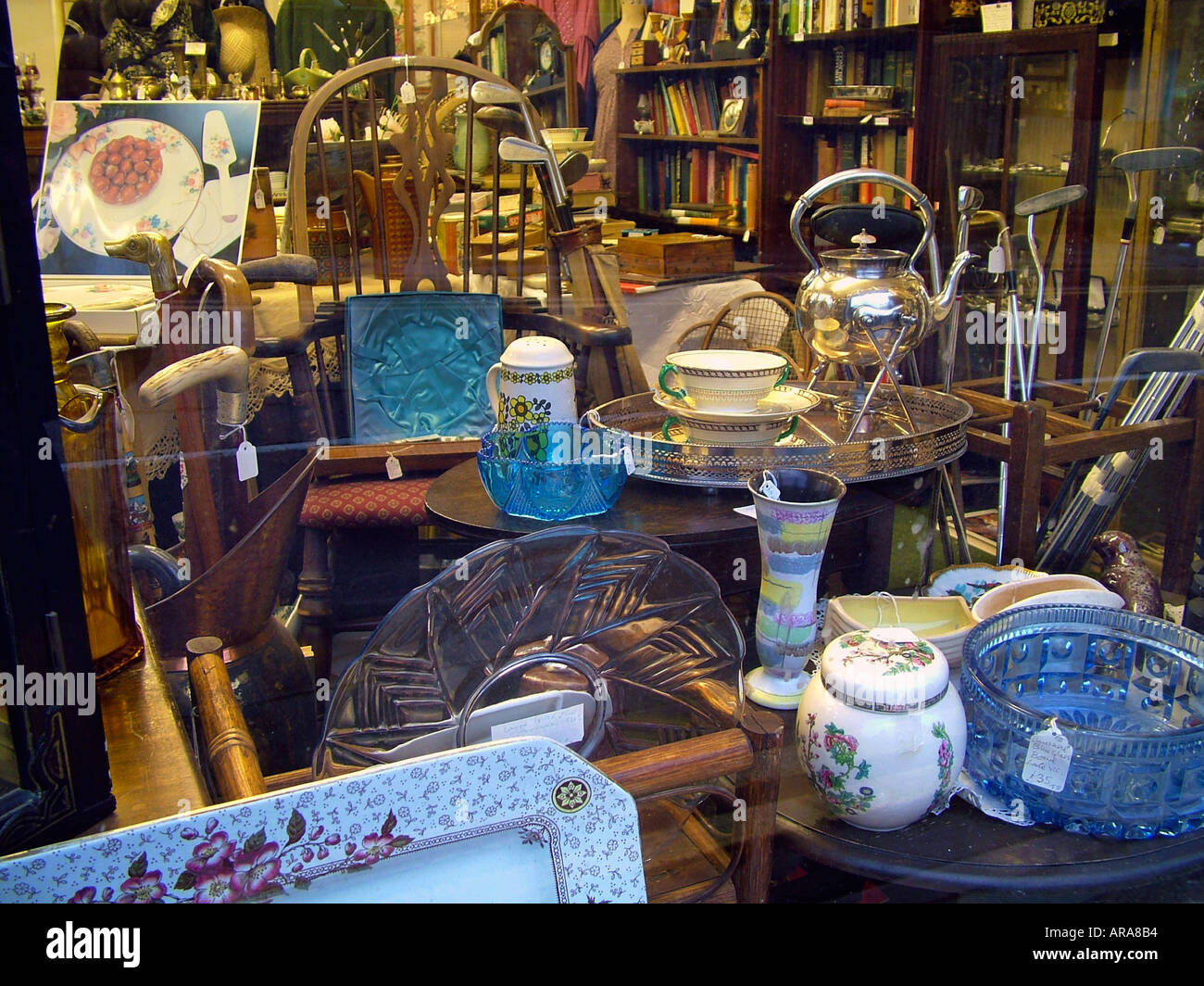 Window display of traditional junk shop in Kent England Stock Photo - Alamy