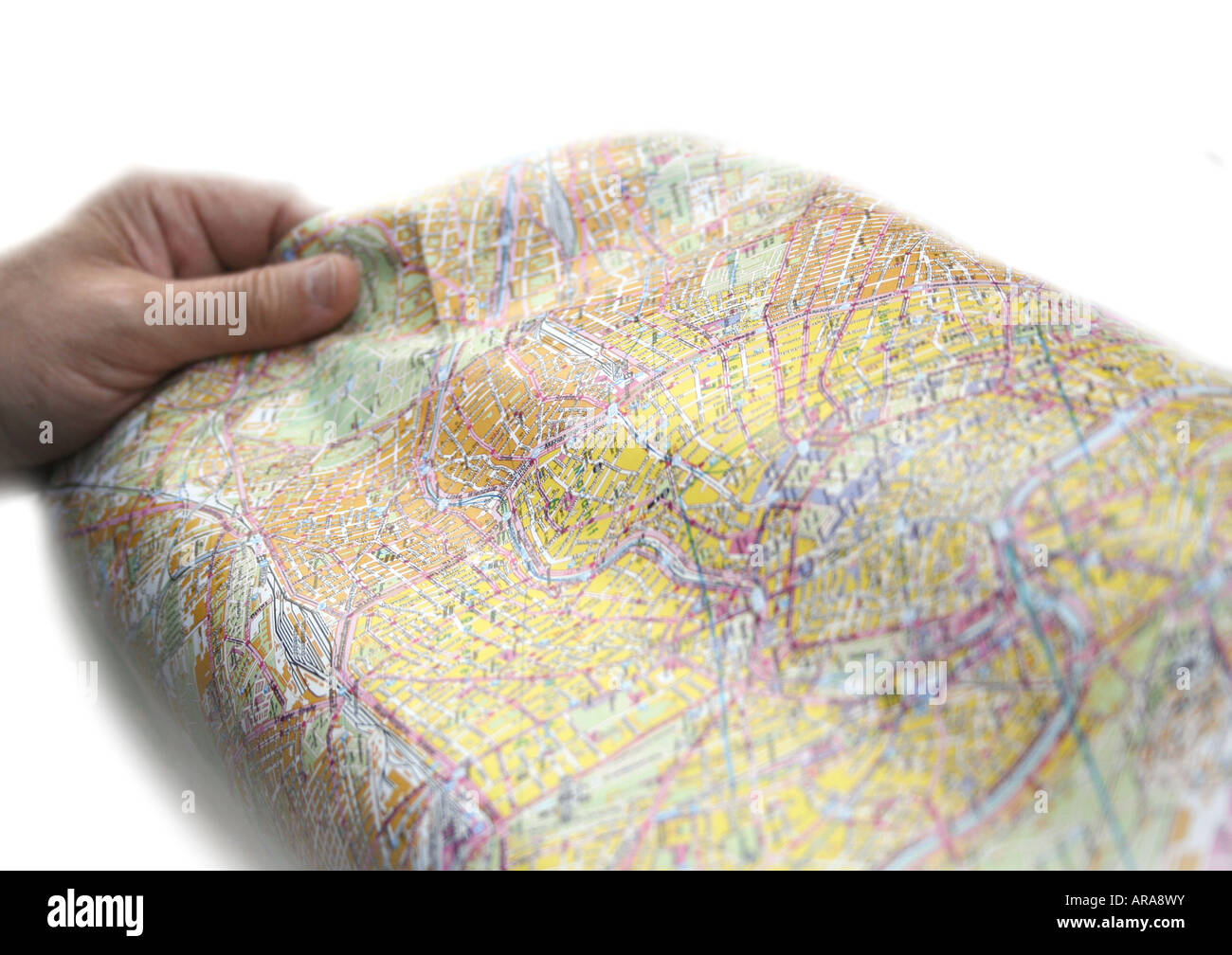 Man finding his way on a map Stock Photo - Alamy