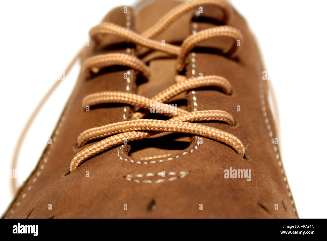 One brown shoe. Isolated on white Stock Photo - Alamy