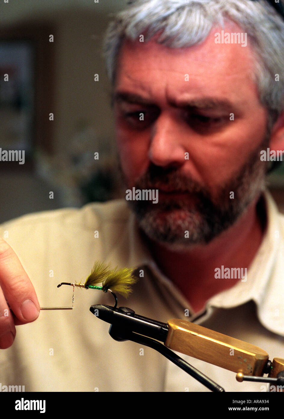 Making a fly for fly fishing Stock Photo - Alamy