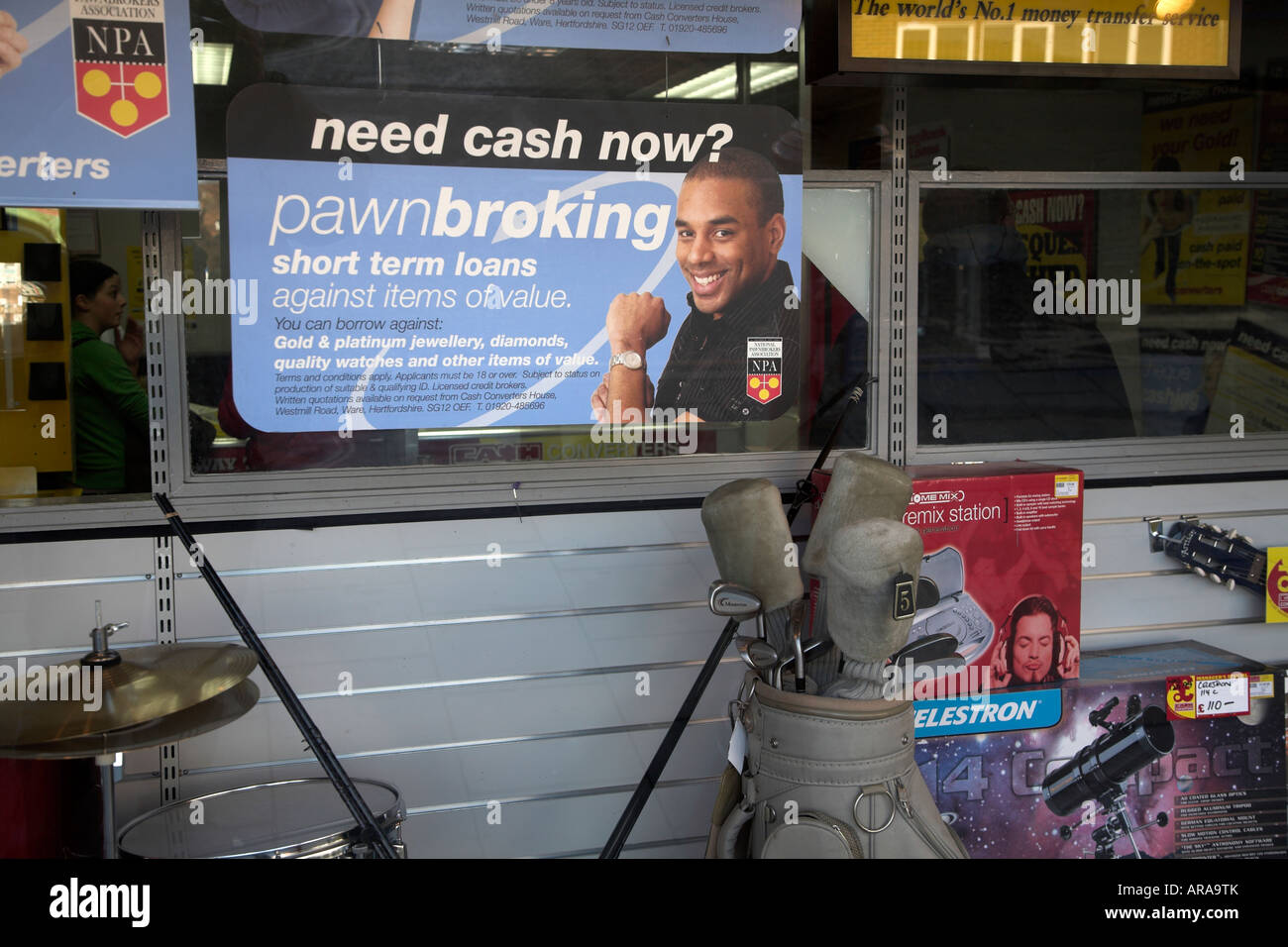 Shop window display in modern pawnbroker shop Ipswich, Suffolk Stock ...