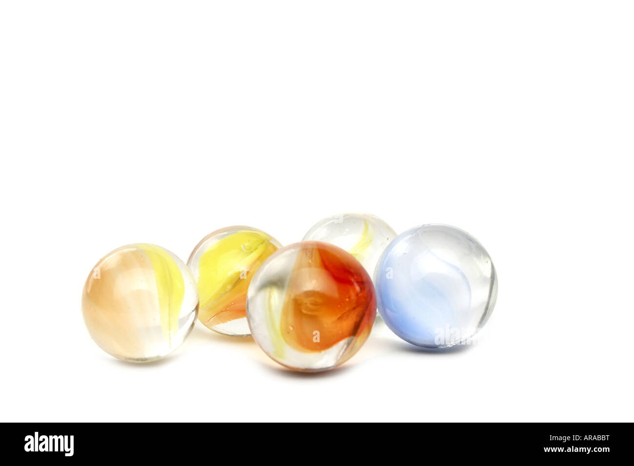 Marbles on a white background Stock Photo - Alamy