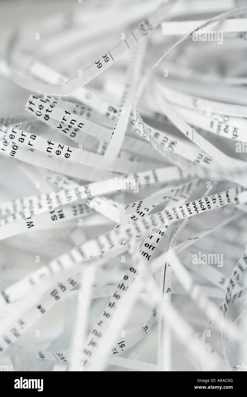Documents shredded in a document shredder Stock Photo - Alamy