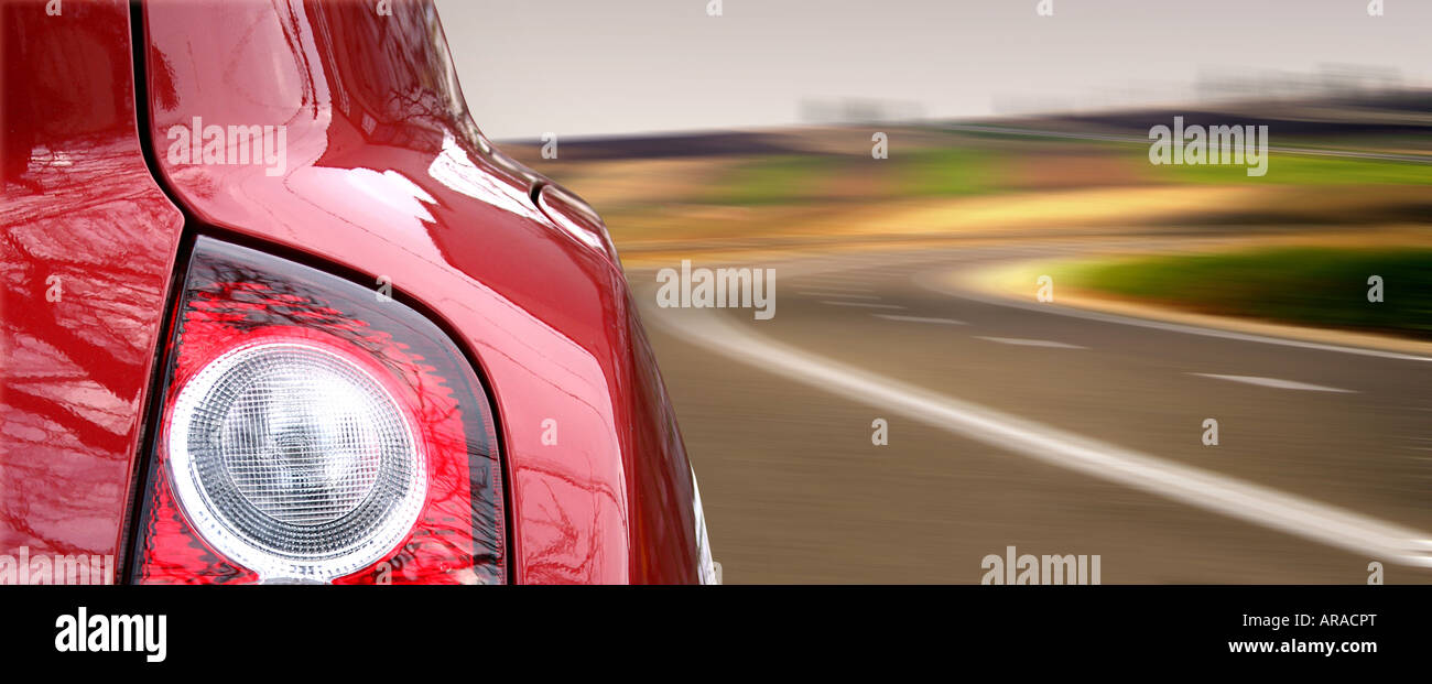 Red car on the highway Stock Photo - Alamy