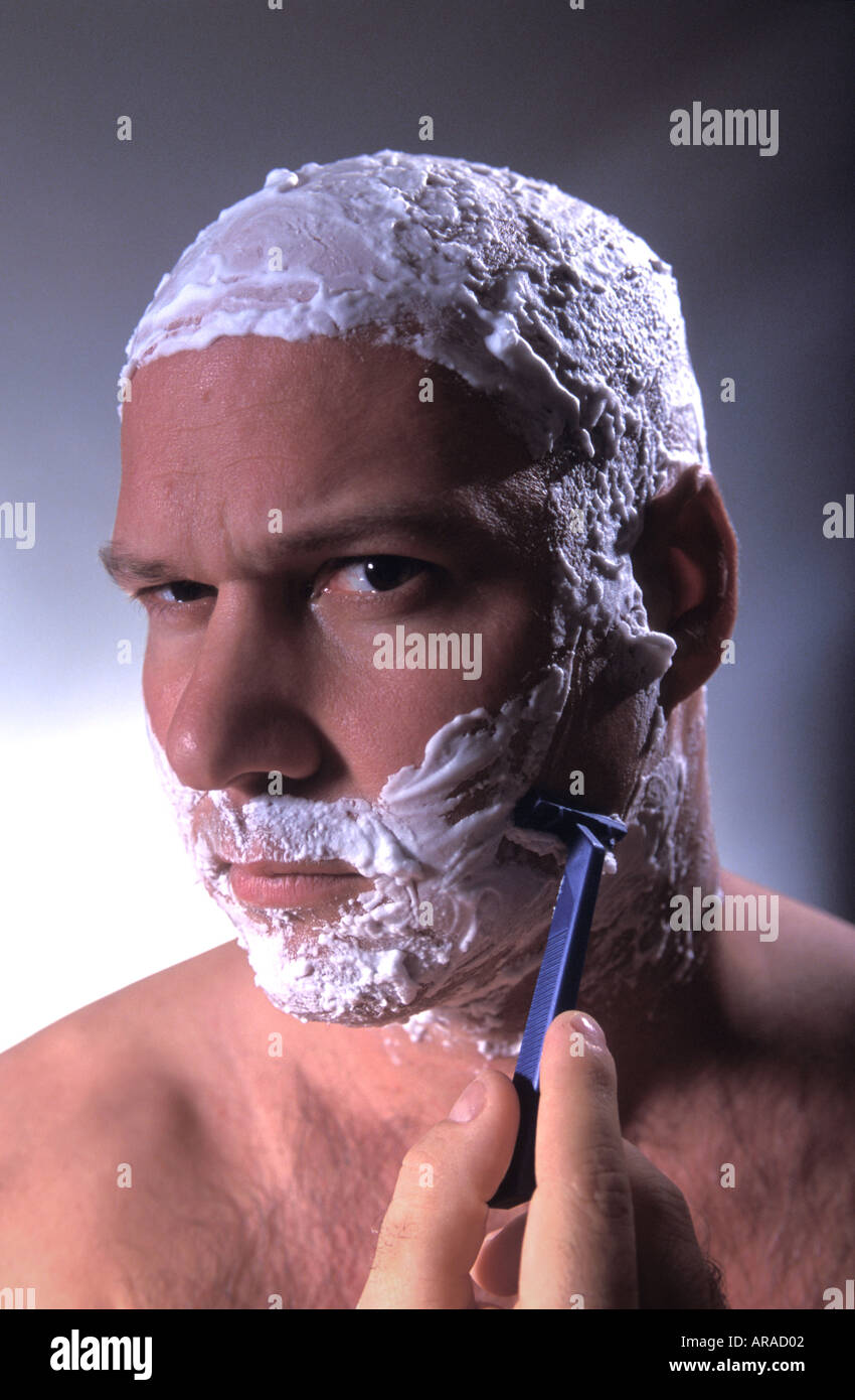 BALD MAN SHAVING Stock Photo - Alamy