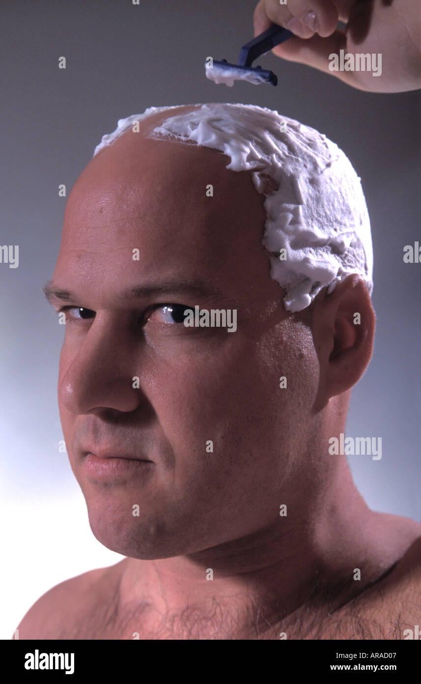 BALD MAN SHAVING Stock Photo - Alamy