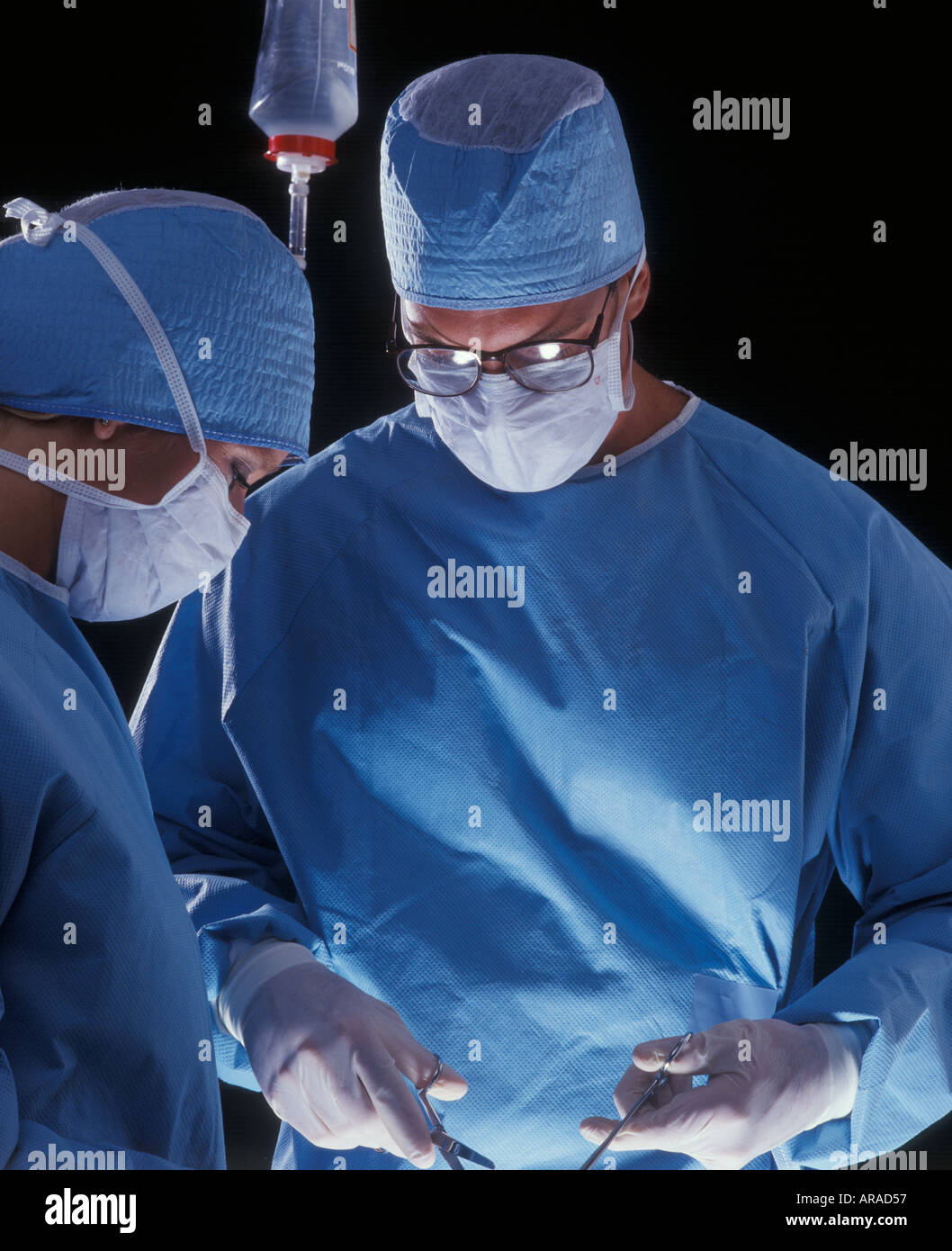 surgeon and nurse in operating room Stock Photo - Alamy