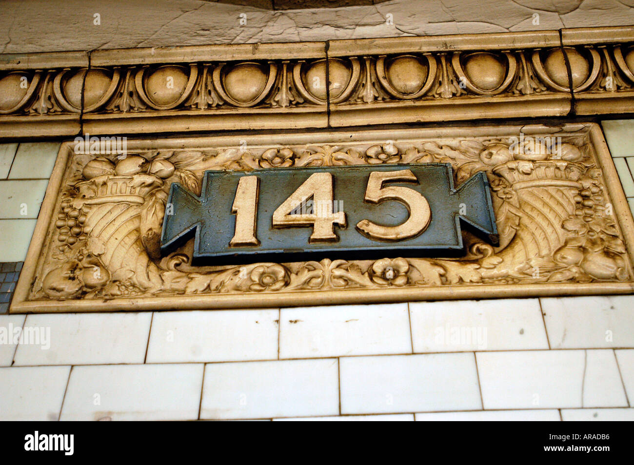 Mosaic decorations in NYC subway Stock Photo - Alamy