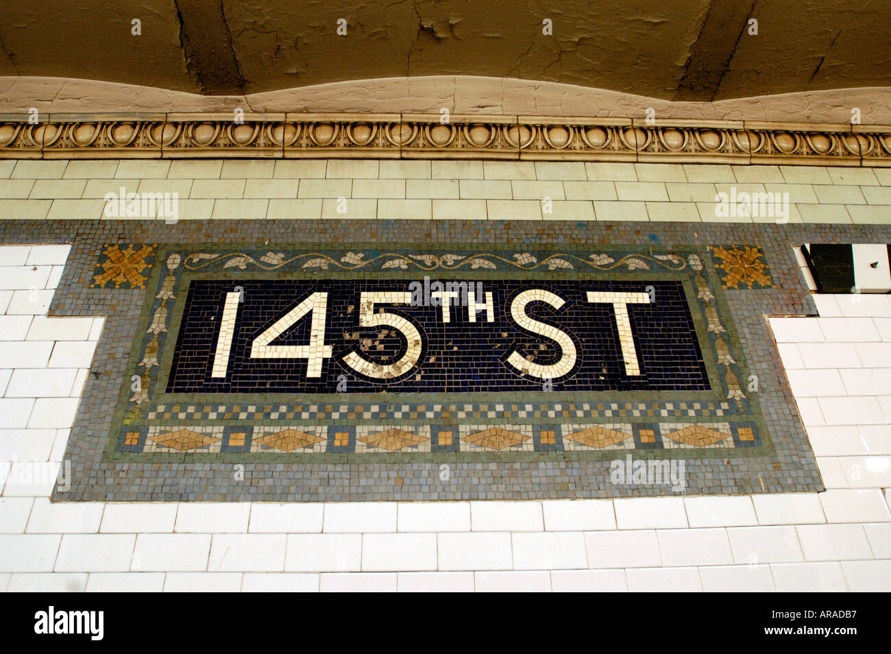 Mosaic decorations in NYC subway Stock Photo - Alamy