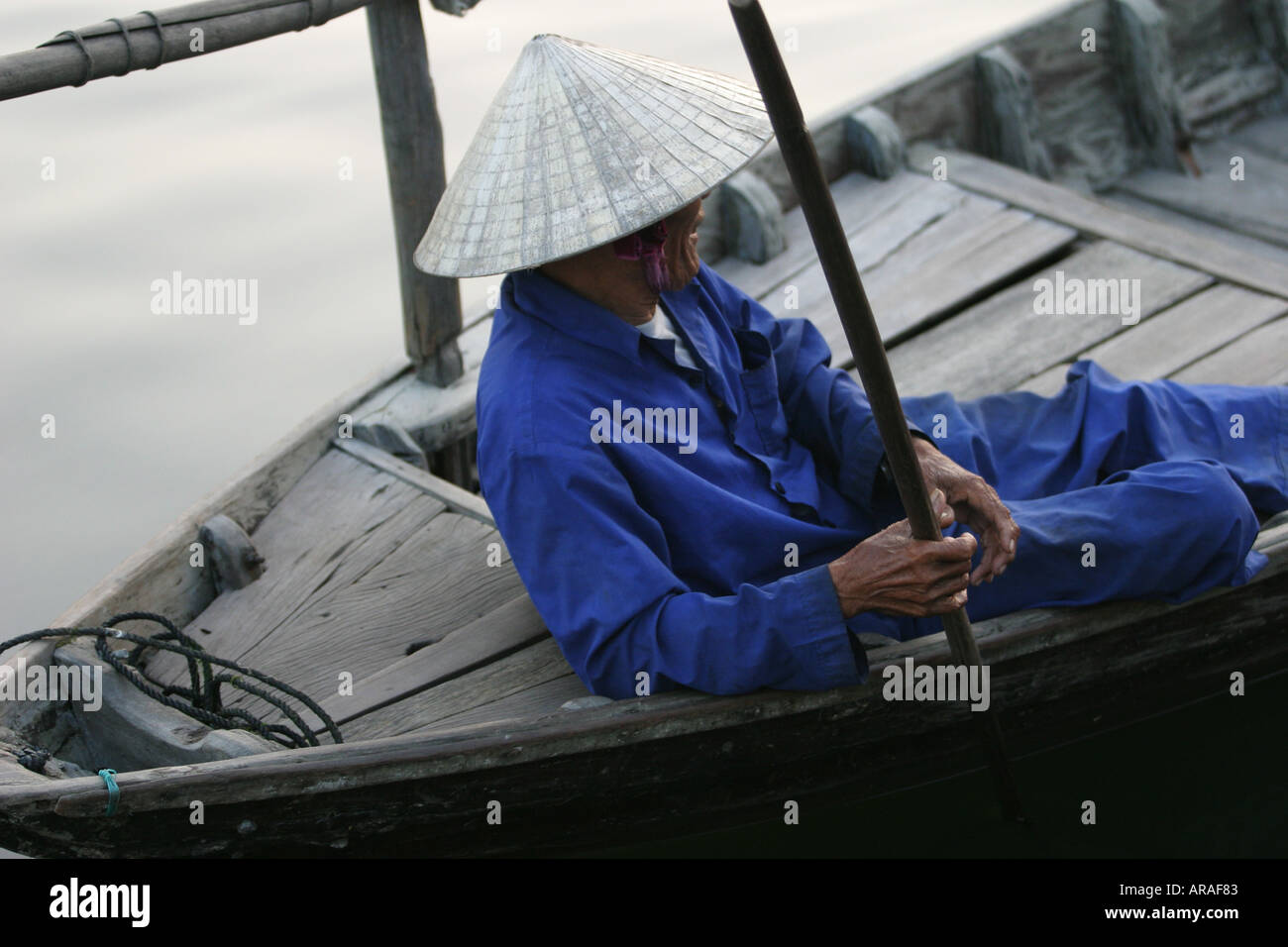 Oarsman and boat in Hoi An Vietnam Stock Photo - Alamy