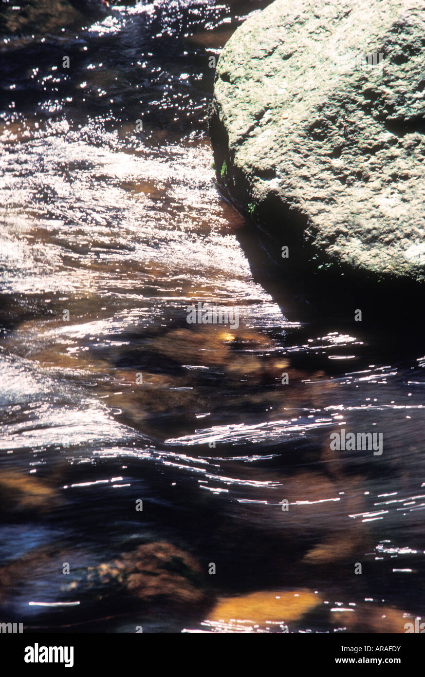 Abstract iconic mountain stream running water large boulder bucolic ...