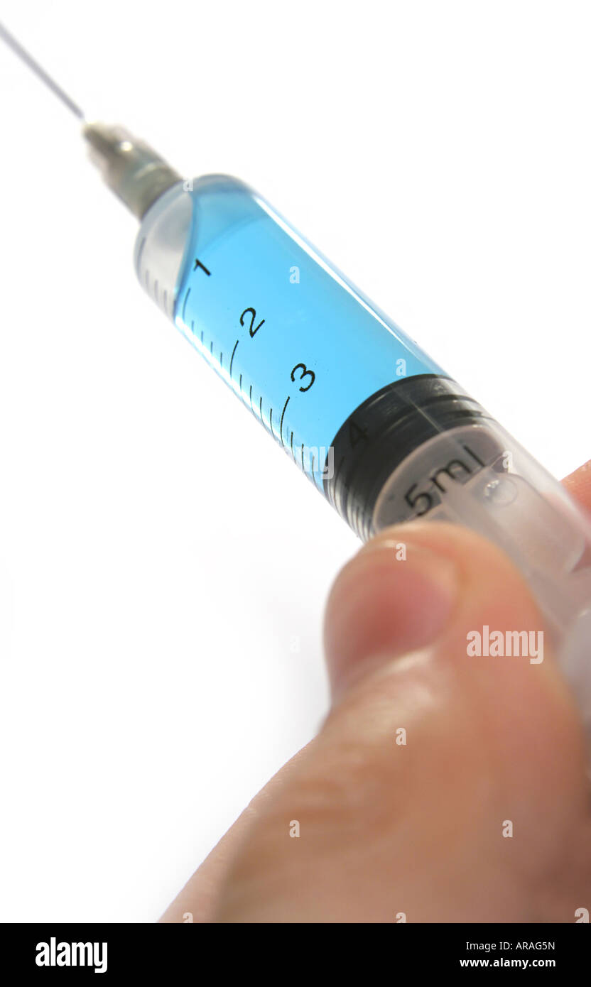 hand with syringe isolated on white Stock Photo - Alamy