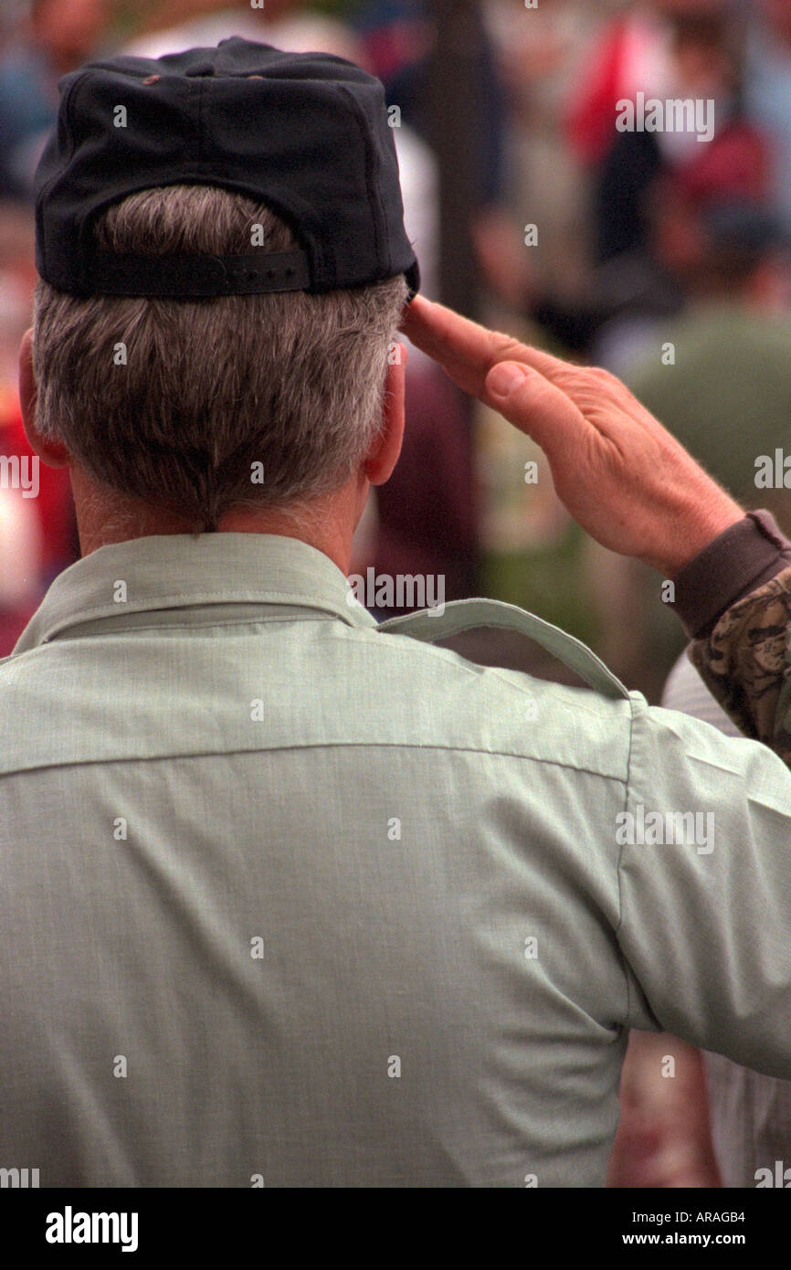 Veteran age 55 saluting at Memorial Day services. St Paul Minnesota MN ...