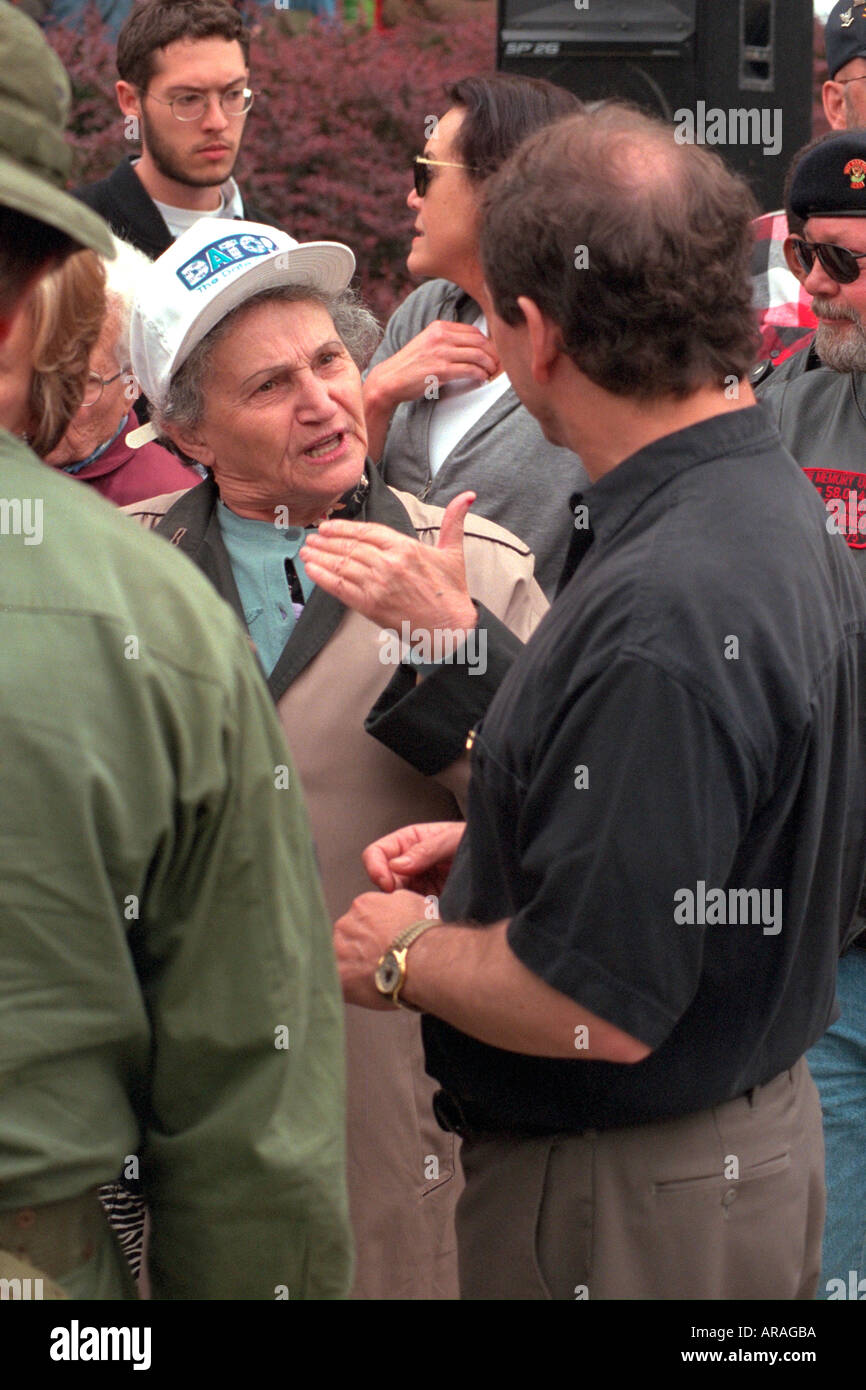 Woman 65 and Senator Paul Wellstone talking communicating at Memorial ...
