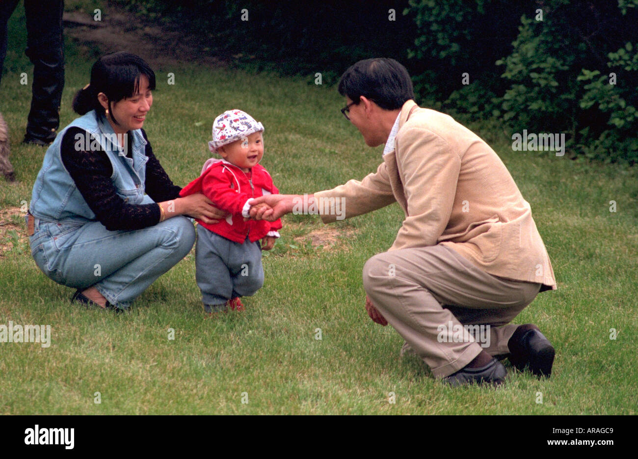 Asian american family mom dad father hi-res stock photography and images - Alamy
