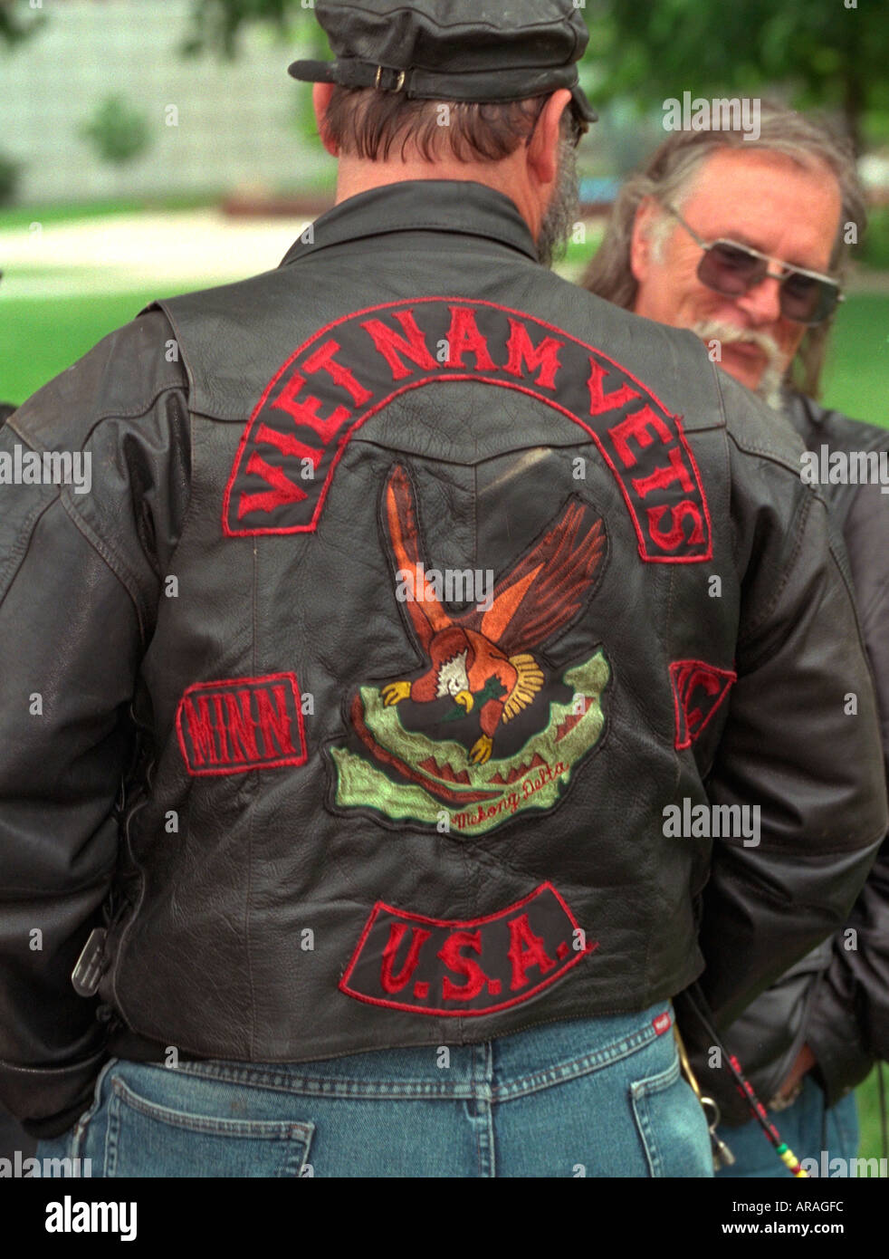 Vietnam veteran age 50 wearing leather jacket with Vietnam Vets ...
