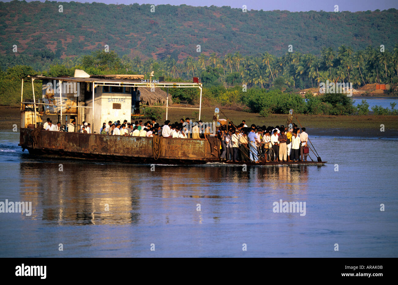 india north goa a ferry crossing the mandovi river Stock Photo - Alamy