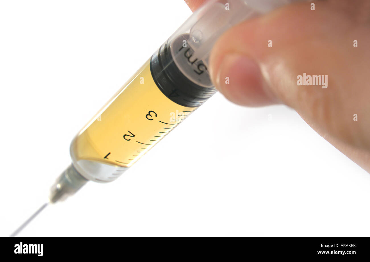 hand with syringe isolated on white Stock Photo - Alamy