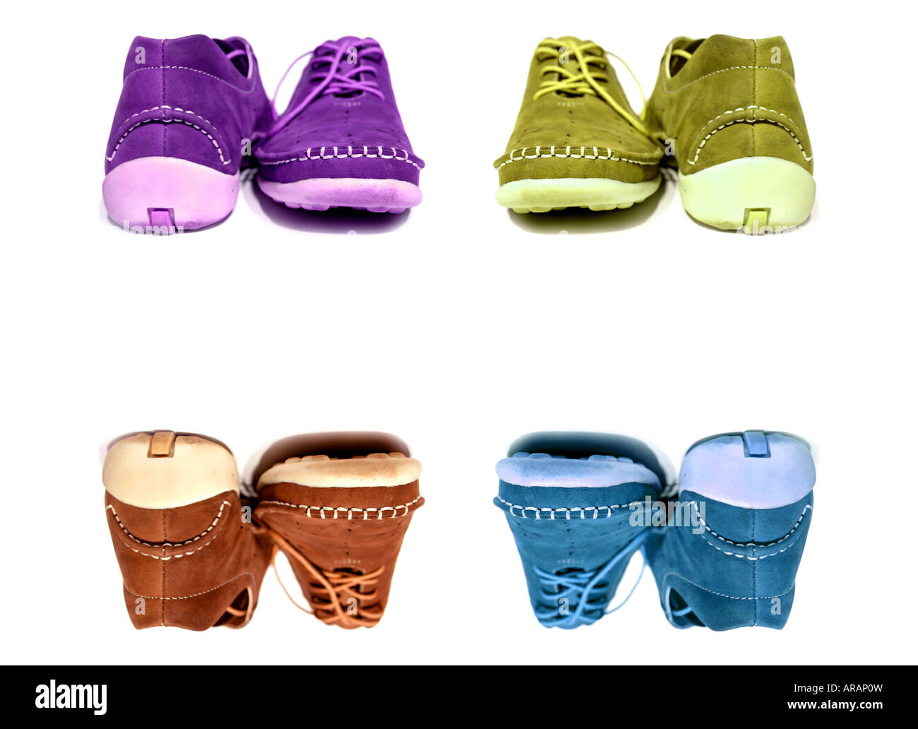 Four pairs of shoes. Isolated on white Stock Photo - Alamy