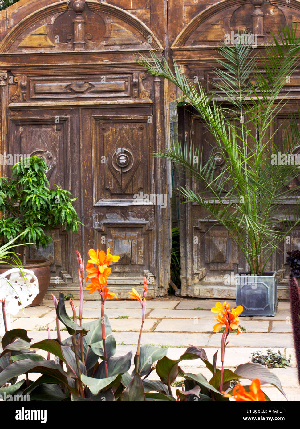 Flower Show large reclaimed temple gate in oriental style garden Stock ...