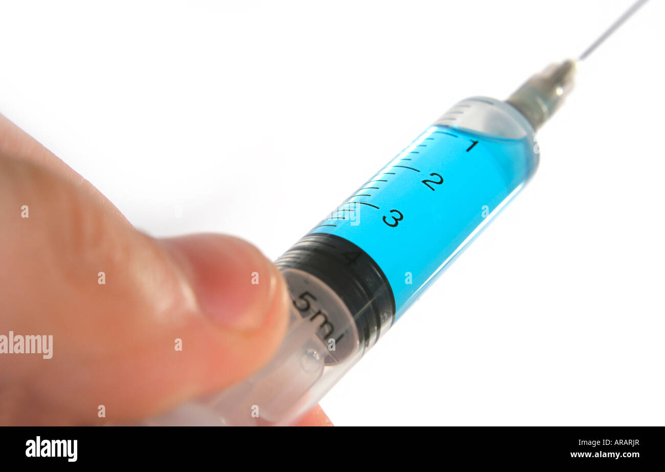 hand with syringe isolated on white Stock Photo - Alamy