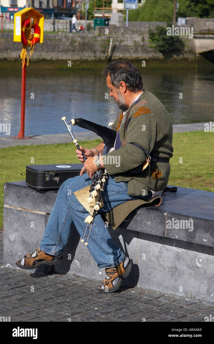 man playing pipe Stock Photo - Alamy