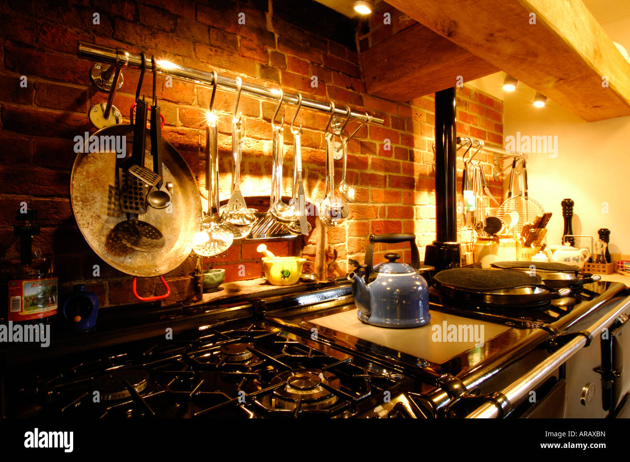 an aga range three compartment ovens in a farmhouse country kitchen ...