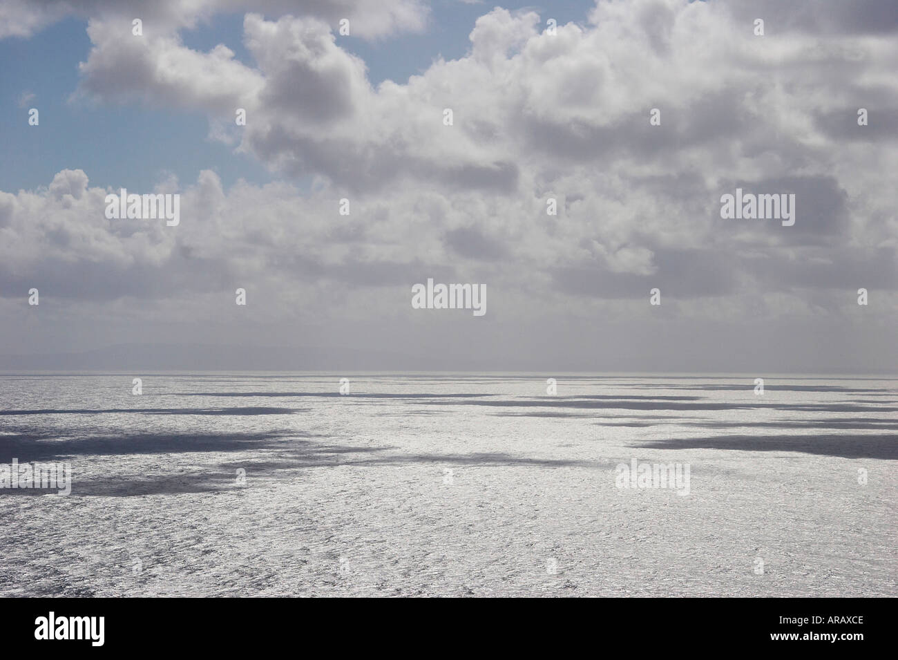 clouds casting shadows on the sea Stock Photo - Alamy