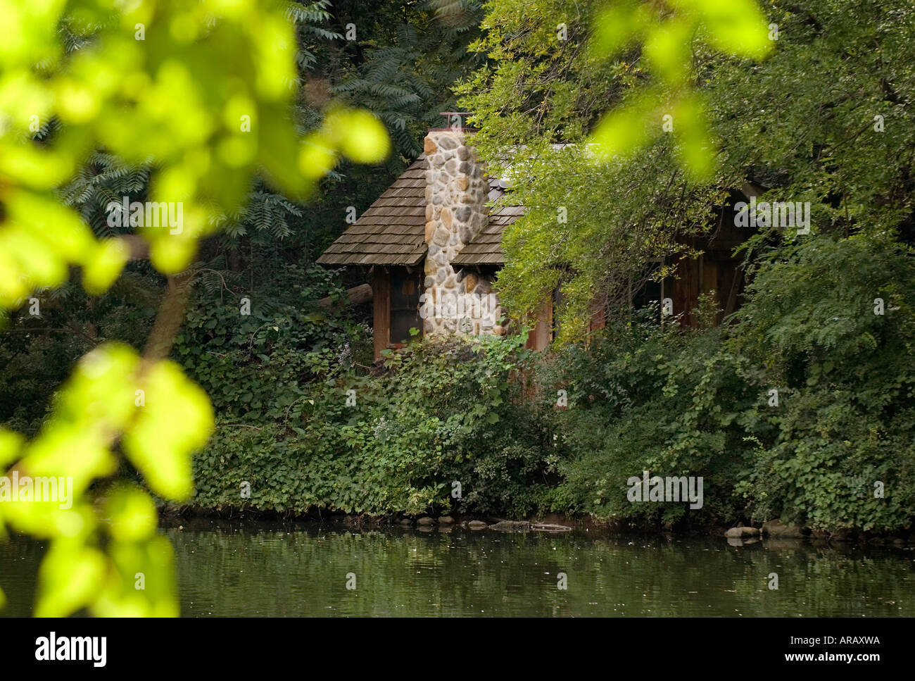 Hidden Cabin on Lake Stock Photo - Alamy