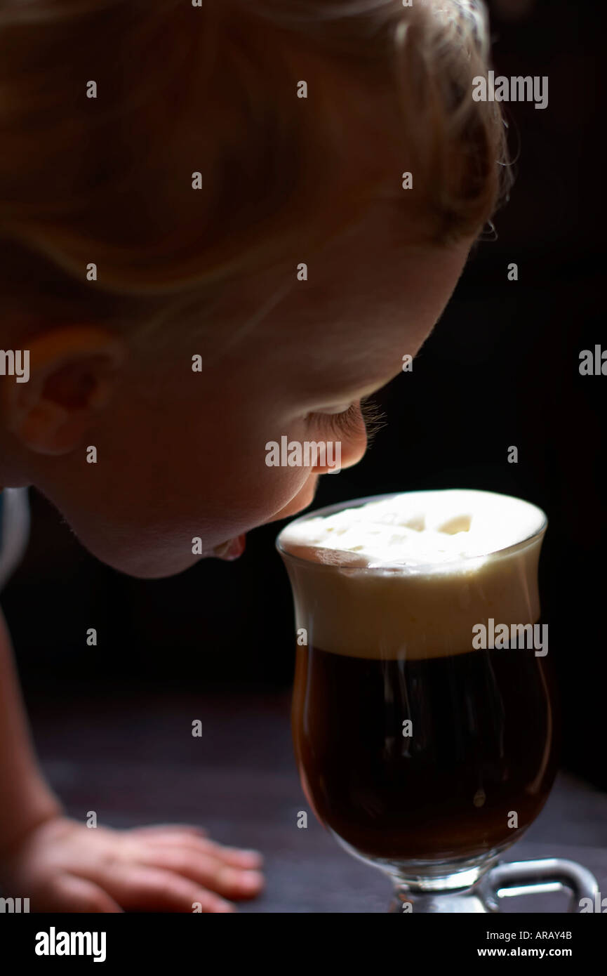 baby tasting Irish coffee Stock Photo - Alamy