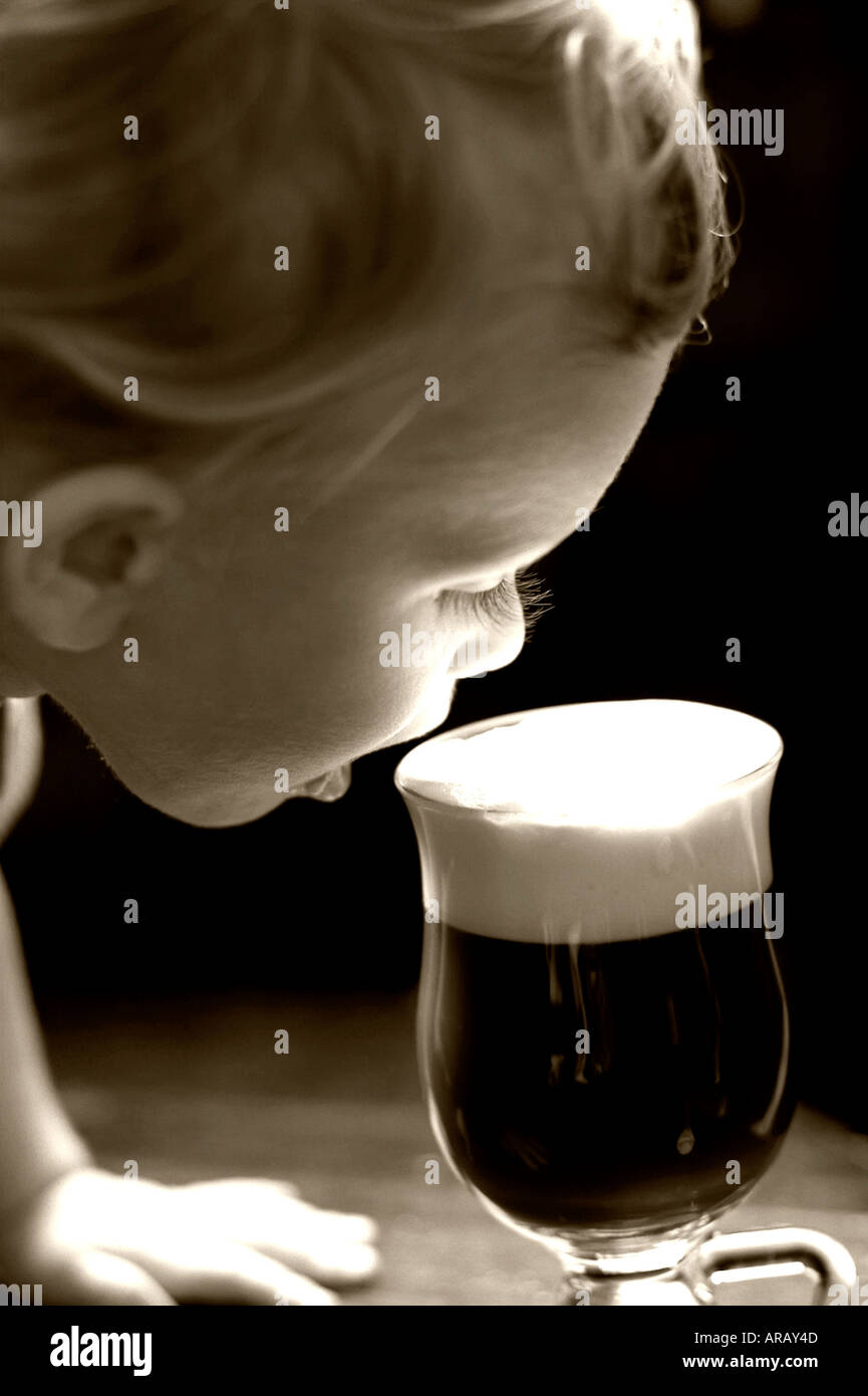 baby tasting Irish coffee Stock Photo - Alamy