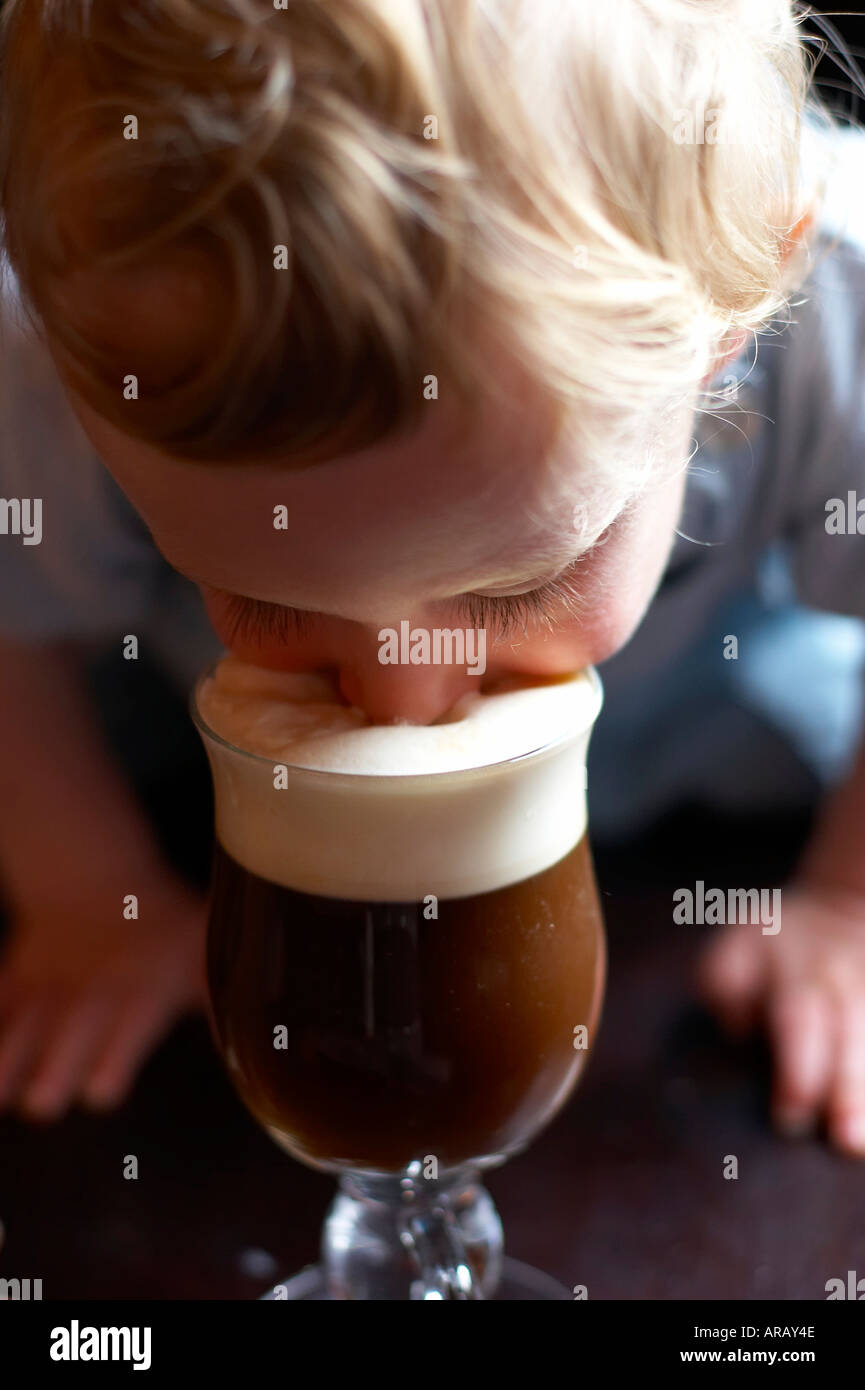 baby tasting Irish coffee Stock Photo - Alamy