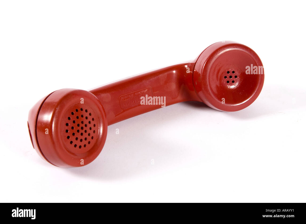 a red dial telephone receiver shot from above on white background Stock ...