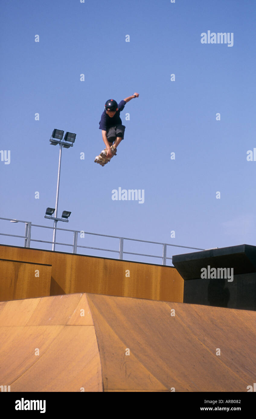 Teen boy speed skating hi-res stock photography and images - Alamy