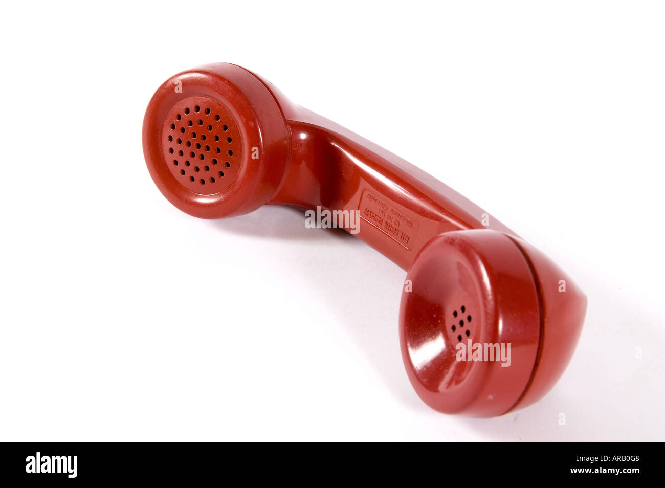 a red dial telephone receiver shot from above on white background Stock ...