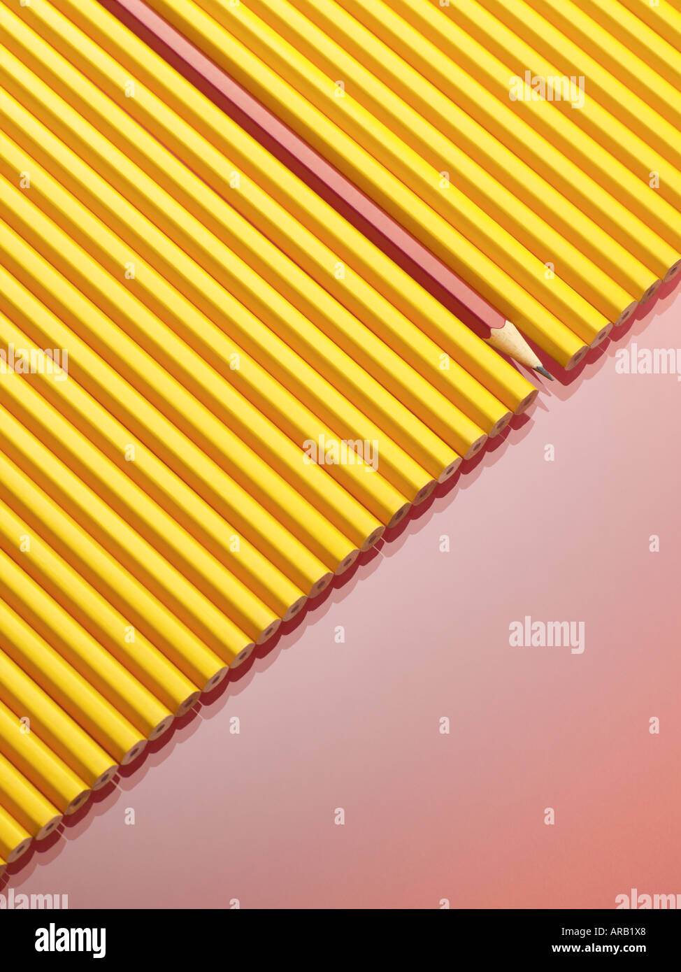 Yellow pencil standing out from crowd hi-res stock photography and ...