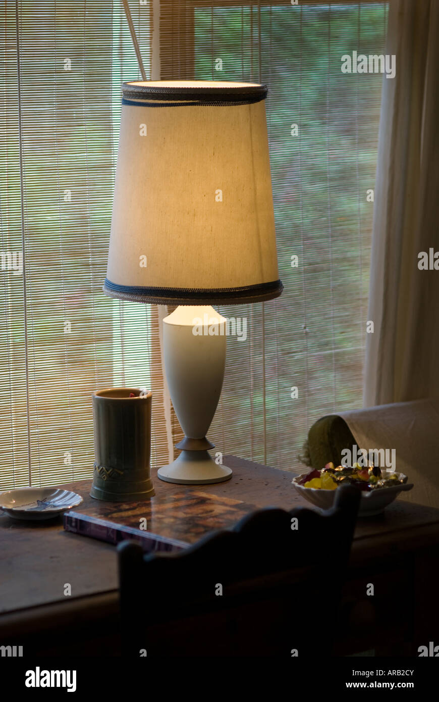 Lamp on Antique table Stock Photo - Alamy