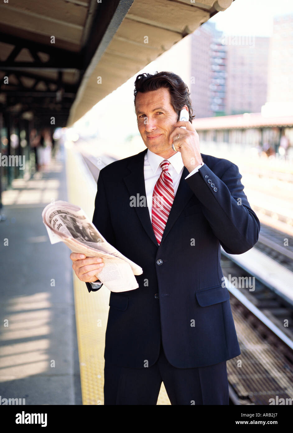 Man on Train Platform Stock Photo - Alamy