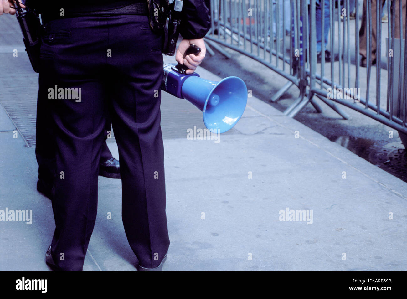 Police officer with megaphone hi-res stock photography and images - Alamy