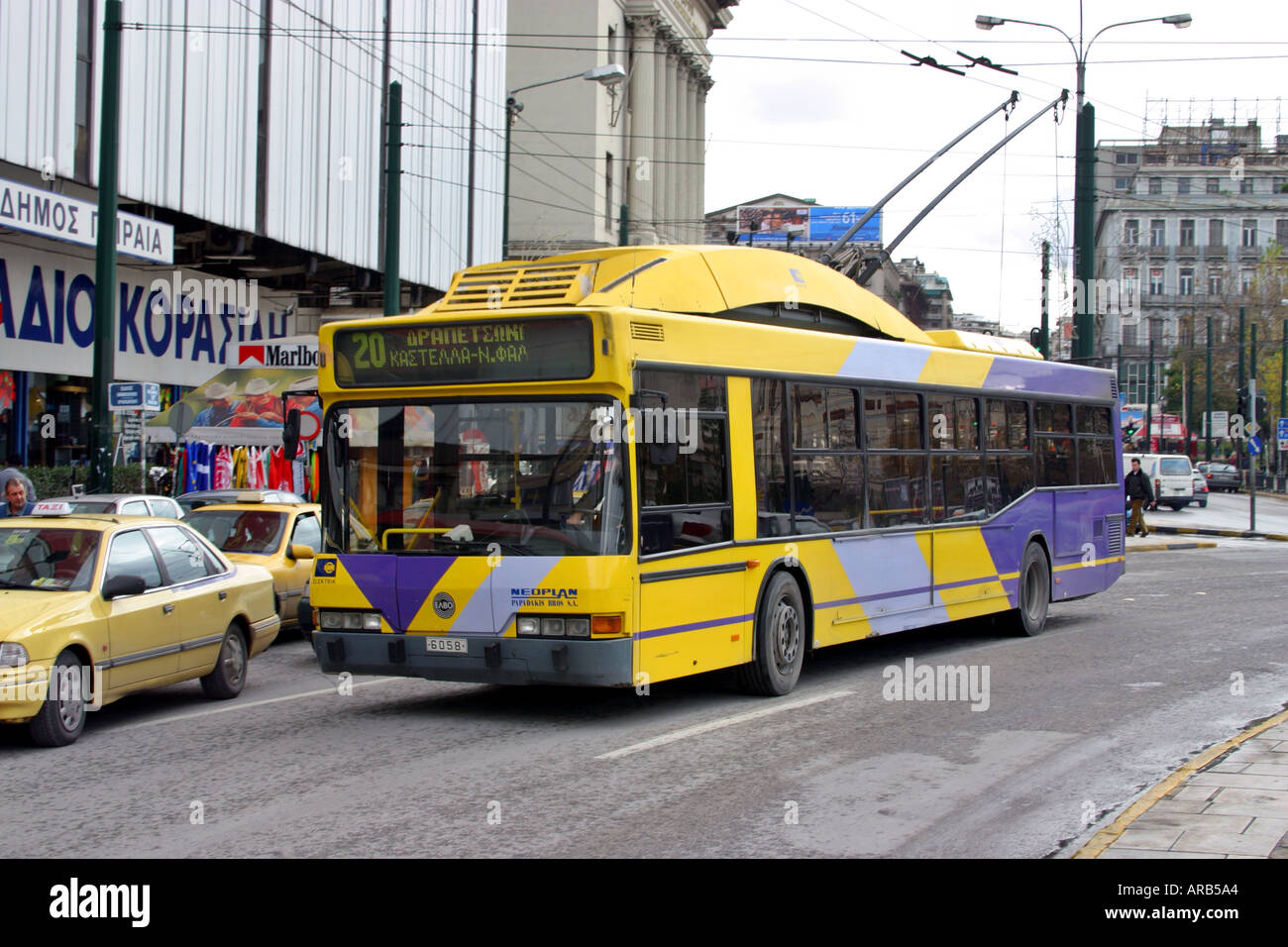Bus cable yellow public Athens transport tram road people passengers ...