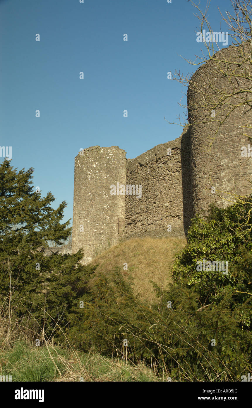Two round towers and wall of ruined castle Stock Photo - Alamy