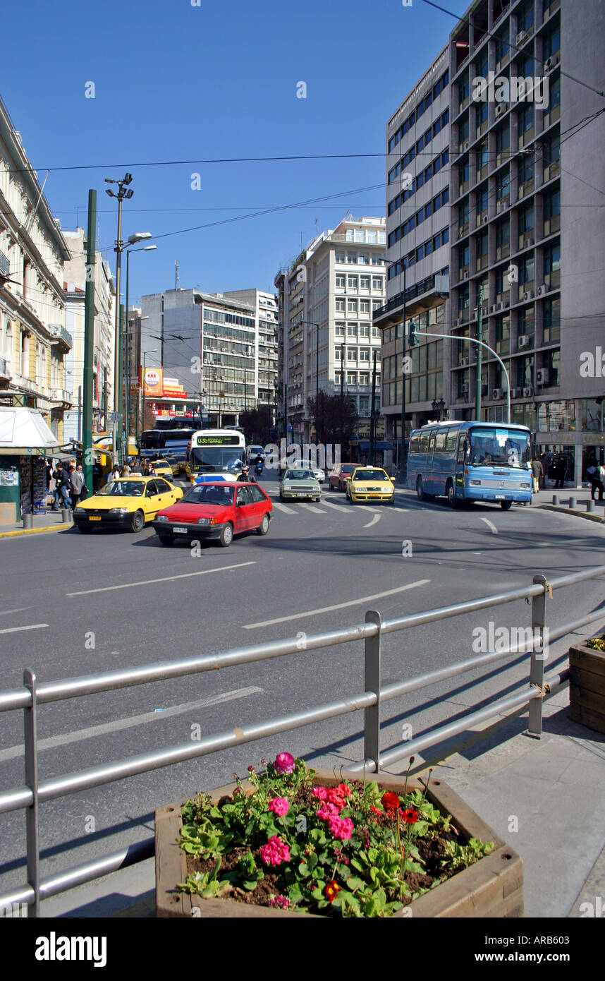 Cars and bus coming from traffic light intersection Omonia square ...