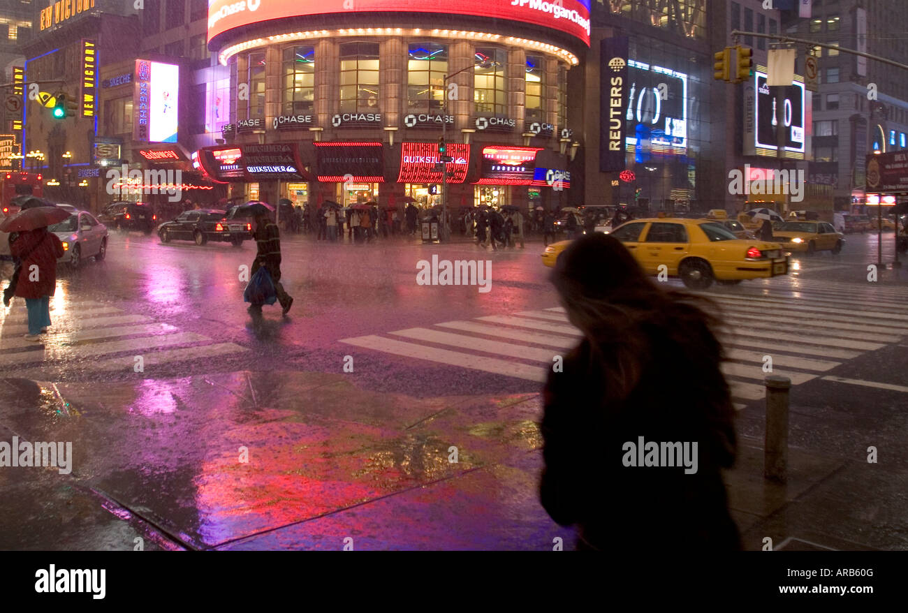 A rainy day in the Times Square area of Manhattan around 42nd Street ...