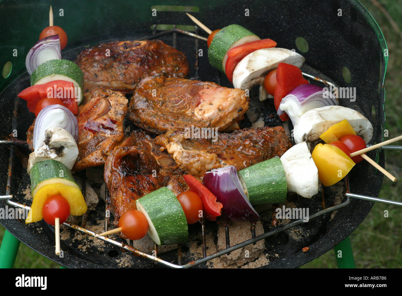 Food being cooked on a barbeque Stock Photo - Alamy