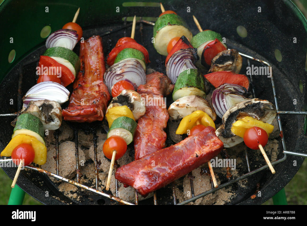 Food being cooked on a barbeque Stock Photo - Alamy