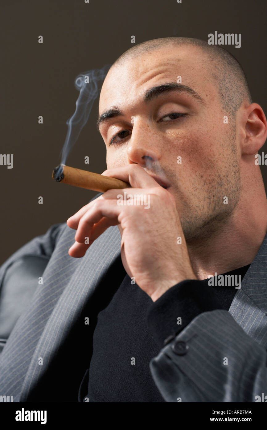 Man Smoking Cigar High Resolution Stock Photography and Images - Alamy