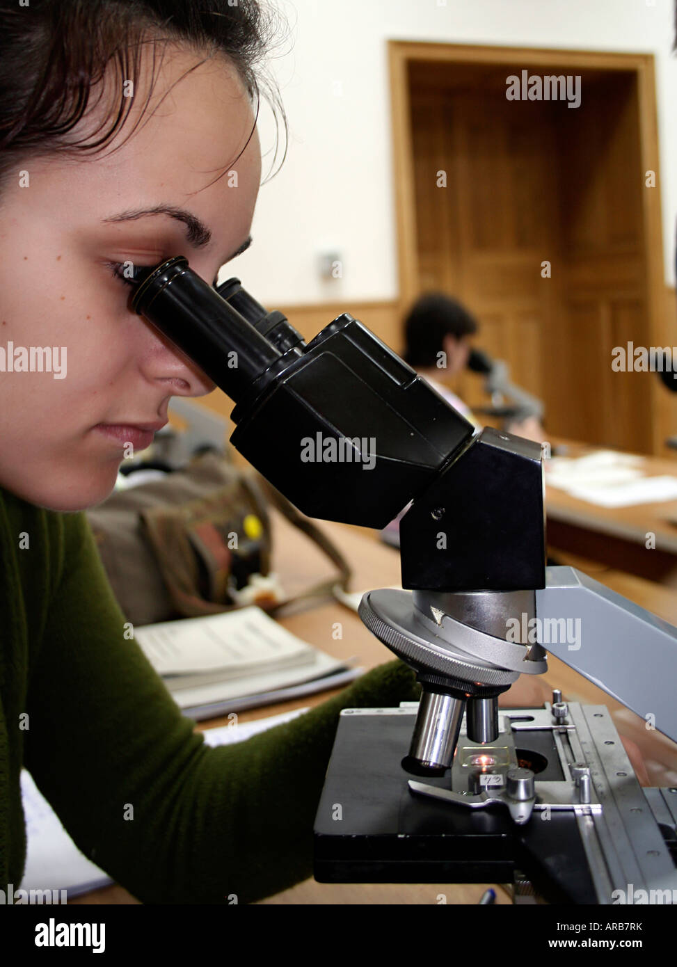 Student working with the microscope Stock Photo - Alamy