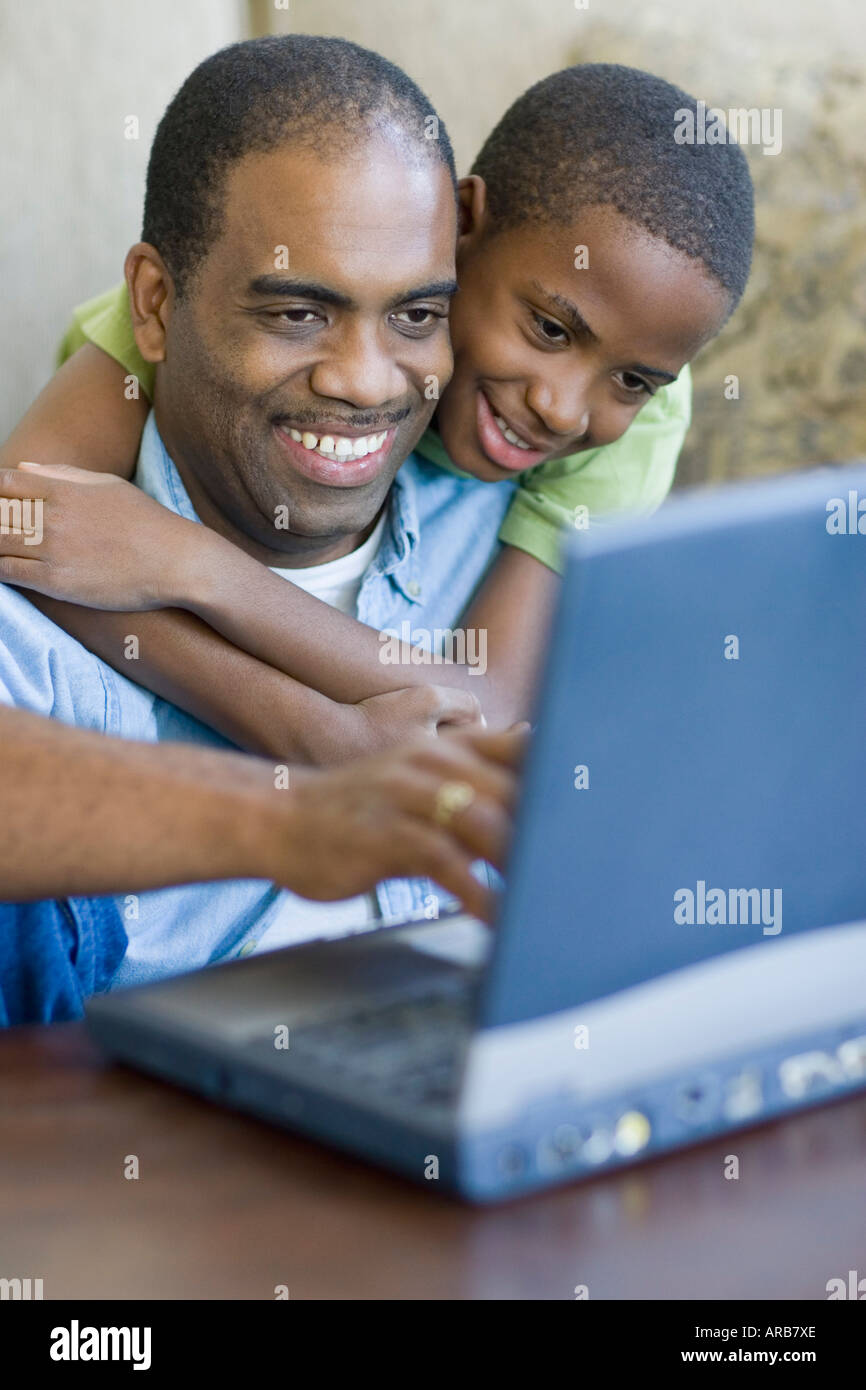 Father and Son with Laptop Computer Stock Photo - Alamy