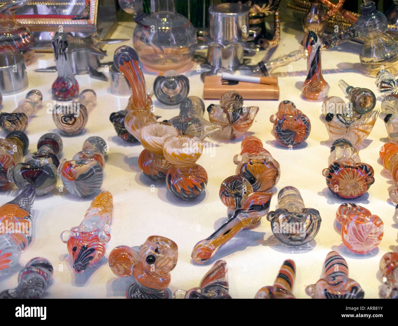 A collection of glass pipes in a store window Stock Photo - Alamy